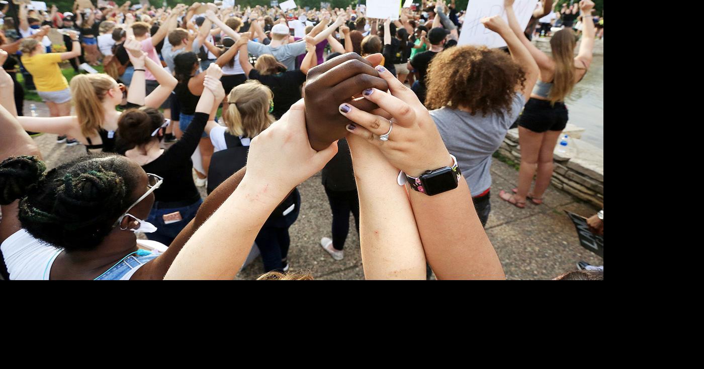 Peaceful protest for racial justice draws hundreds to Davenport park