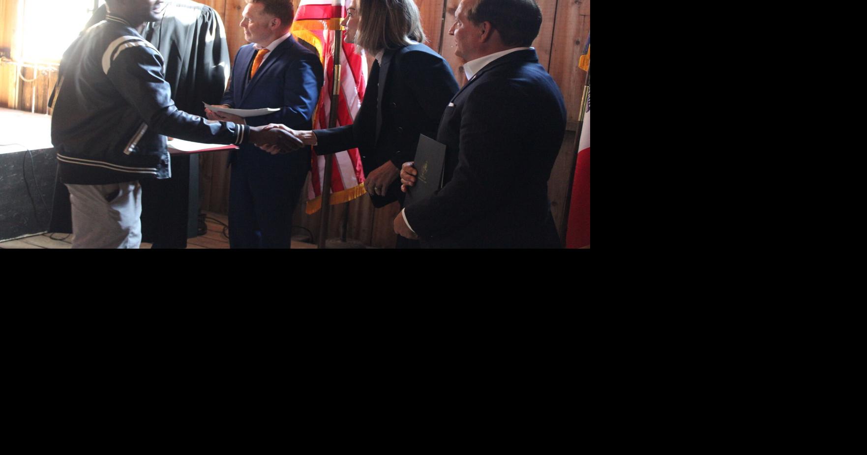 'A matter of commitment and conscience': 42 people become American ...