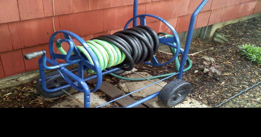 Spray paint gives rusty hose reel new life