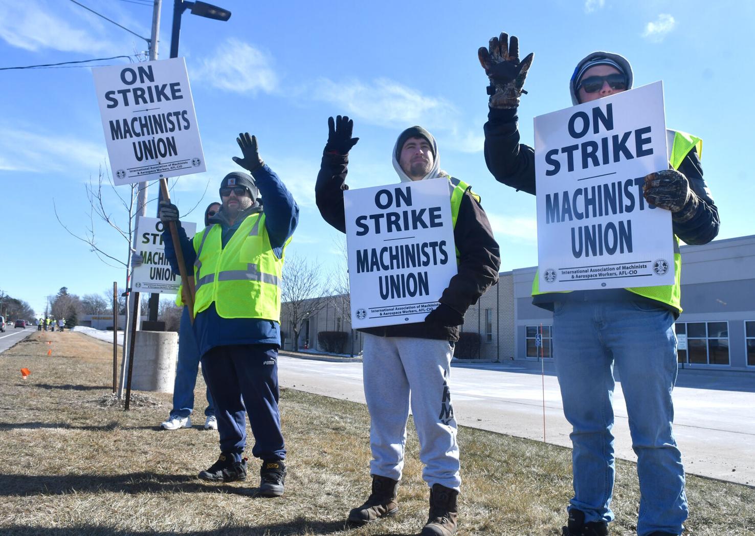 Photos: Strikers man the lines outside Eaton-Cobham Mission Systems ...