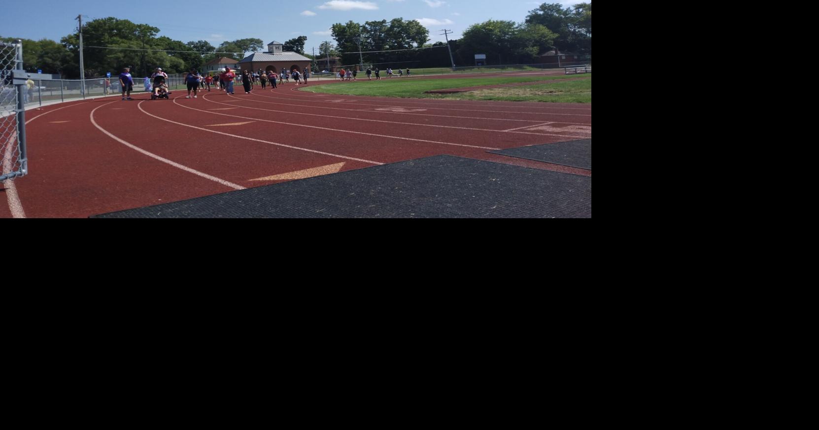 Walkers Sunday at Wharton Field House remember loved ones who died from ...