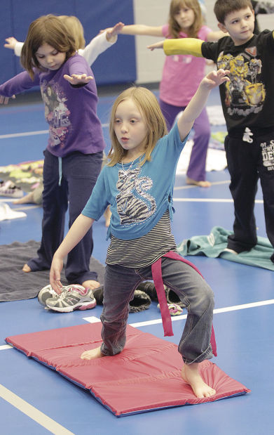 First-graders take a peek at yoga | Local Education | qctimes.com