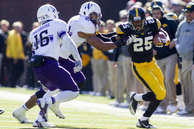 Hawkeye running backs cited in Iowa City