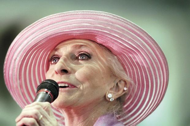 Singer Collins thrills crowd at St. Ambrose event