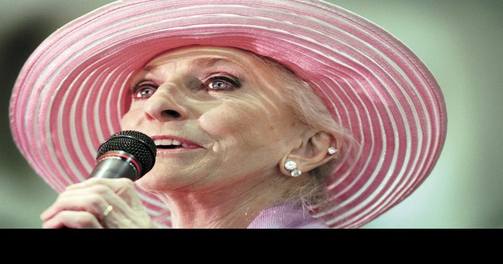 Singer Collins thrills crowd at St. Ambrose event