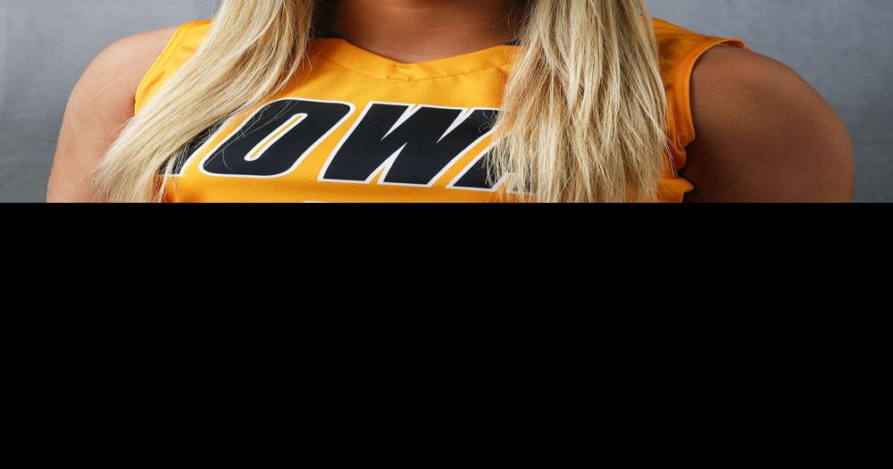 Dixon sets record, but Logic gives Hawkeyes a wild win