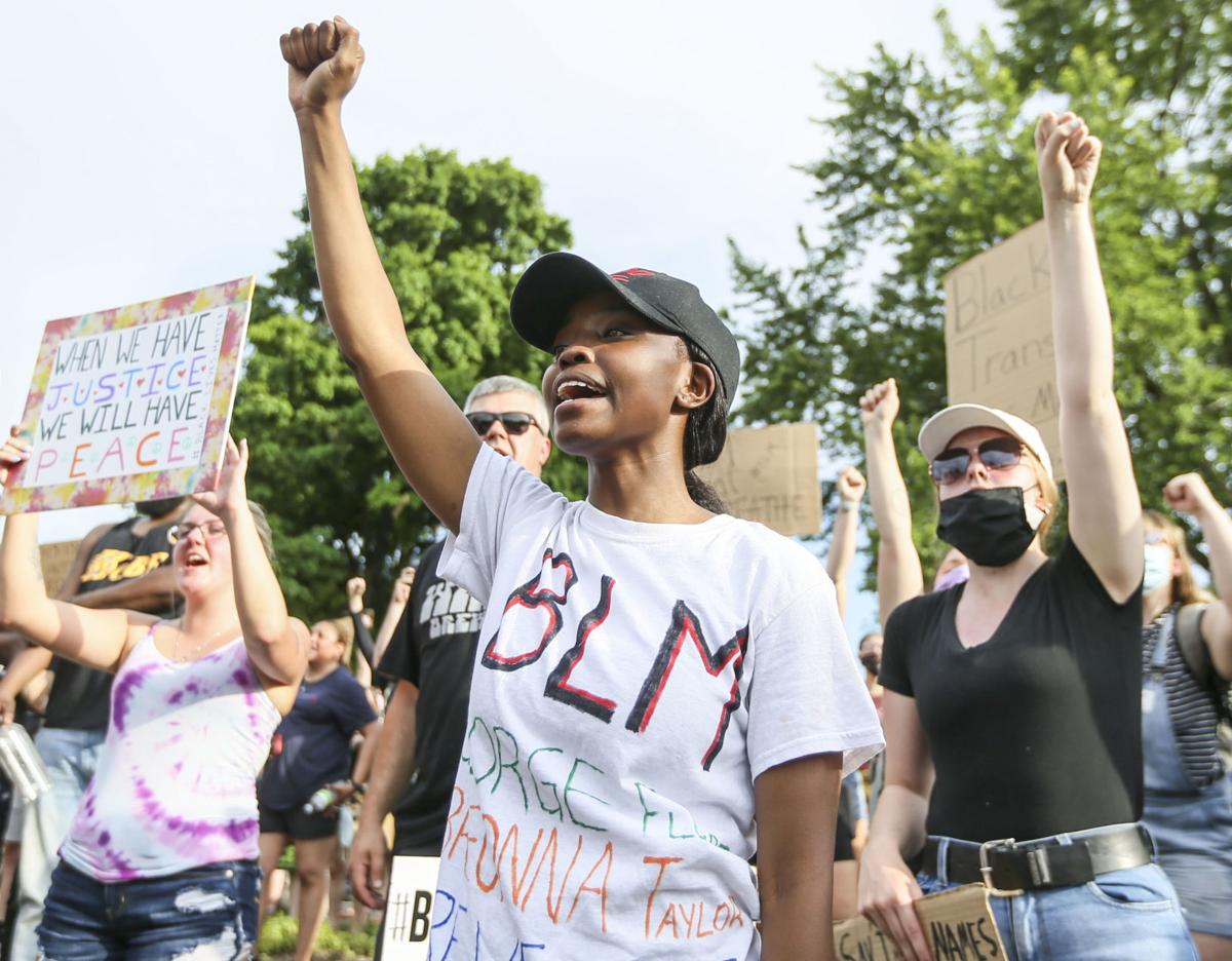 Peaceful protest for racial justice draws hundreds to Davenport park