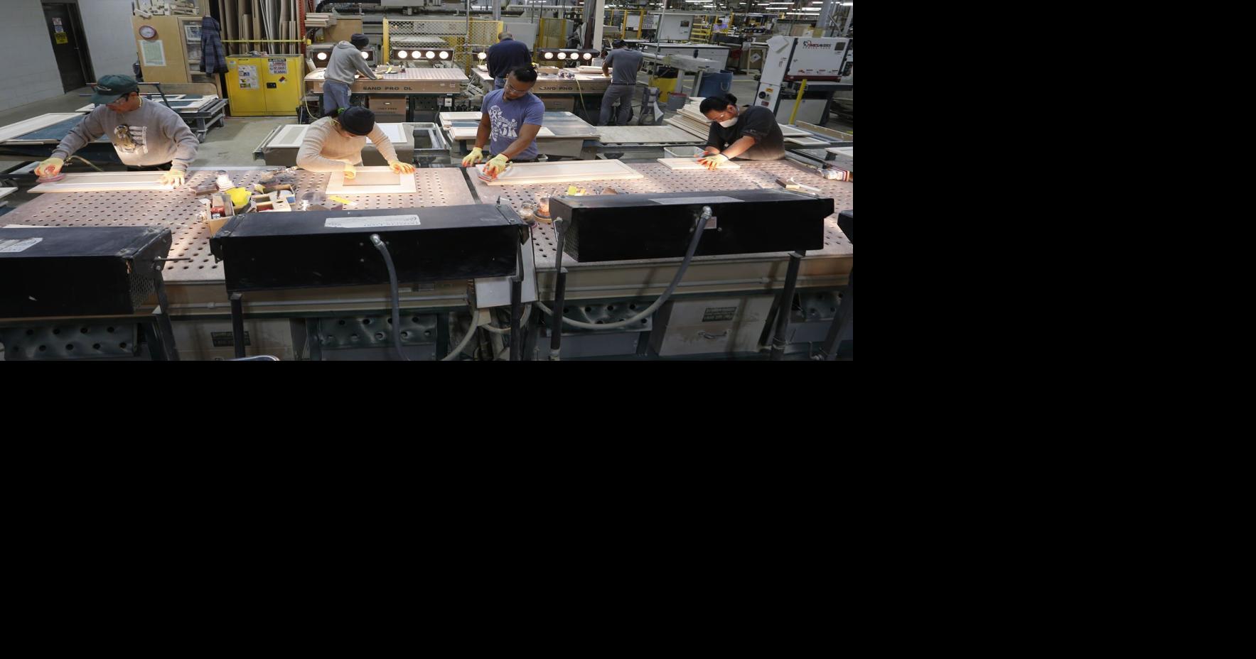 Waterloo cabinet manufacturer says it will lay off 'under 100' employees