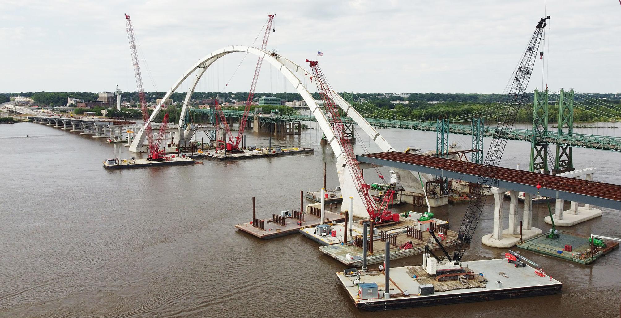 First part of arch floor is raised on I-74 across Mississippi River in ...