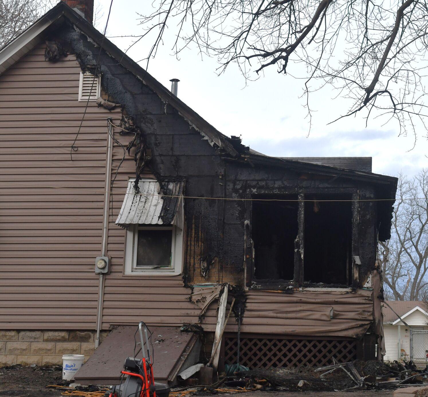 Two charged with arson in connection with blaze at Davenport home