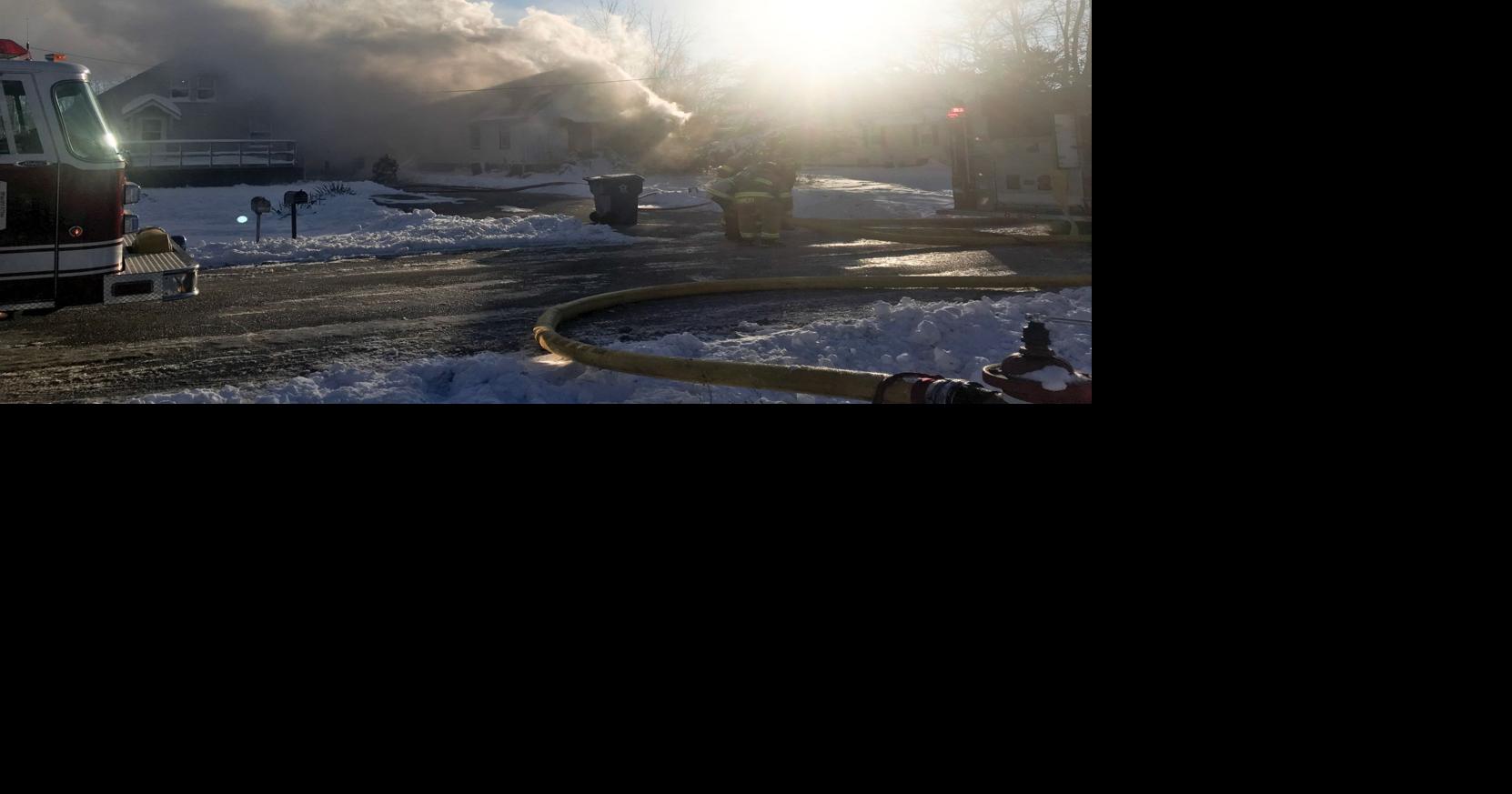 Heavy smoke billows from burning house in East Moline