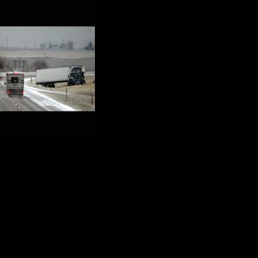 Wintry mix moving through area causing slippery conditions