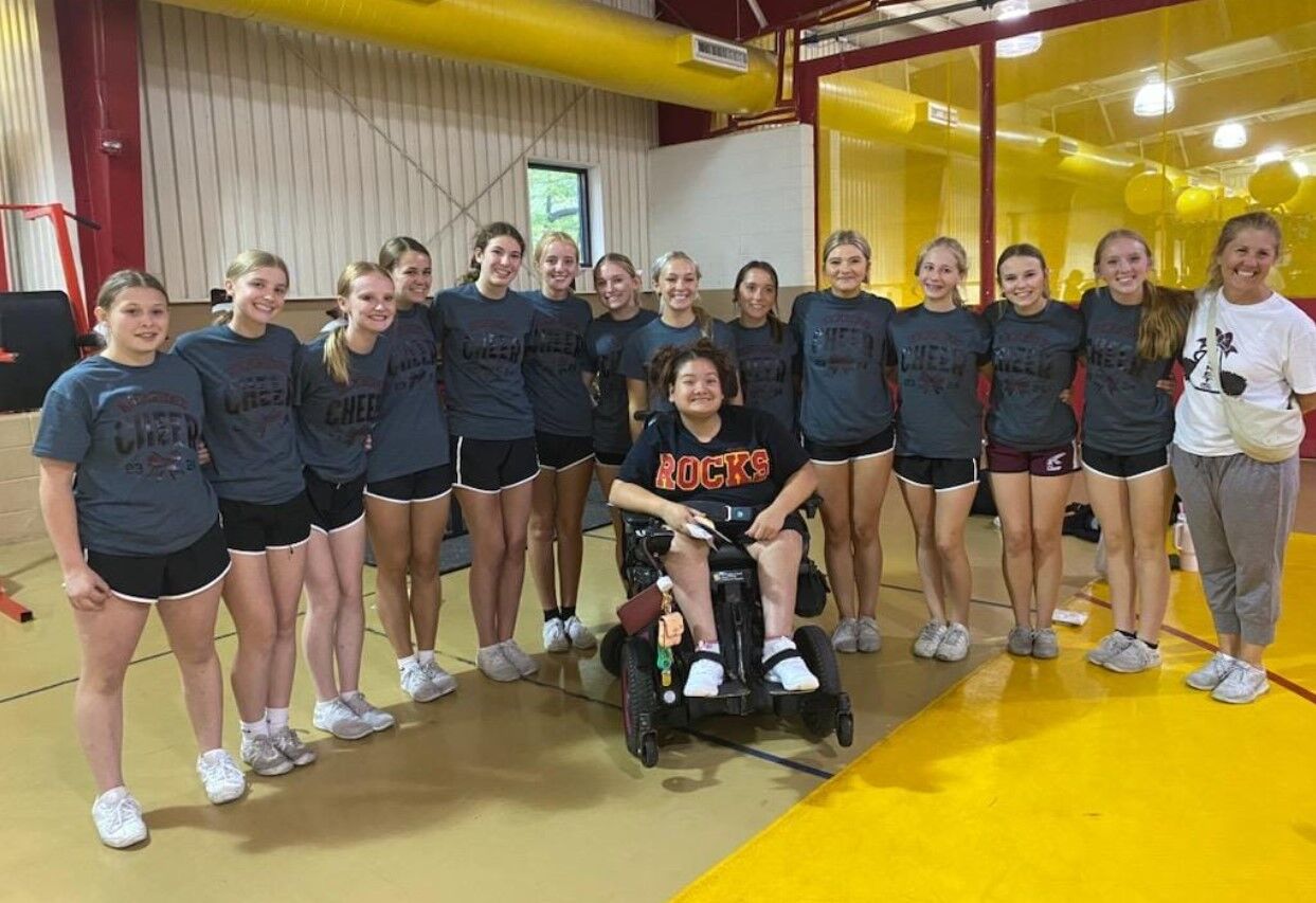 Rockridge, Rock Island cheer squad donate to teammate