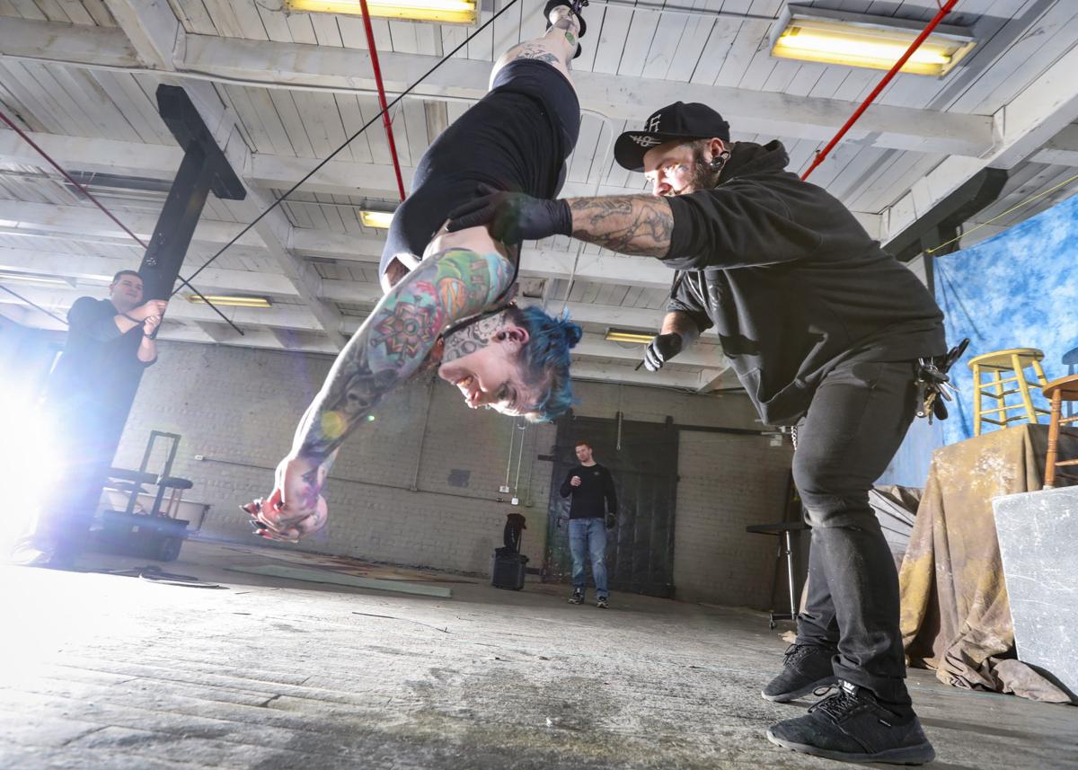 Photos: Manda Rexx of Davenport performs a body suspension