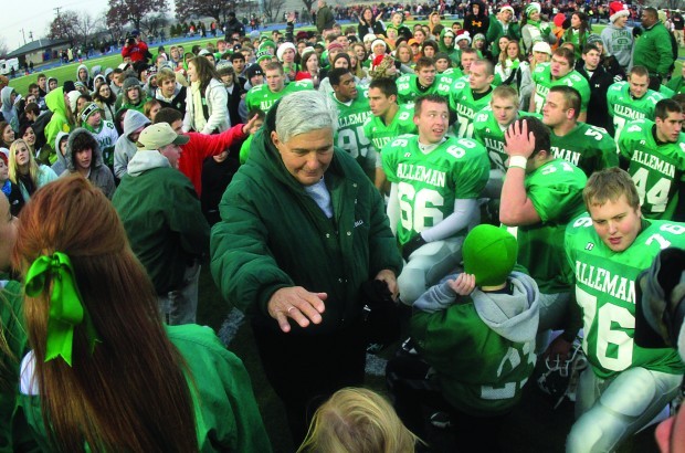 Alleman football near and dear to priest