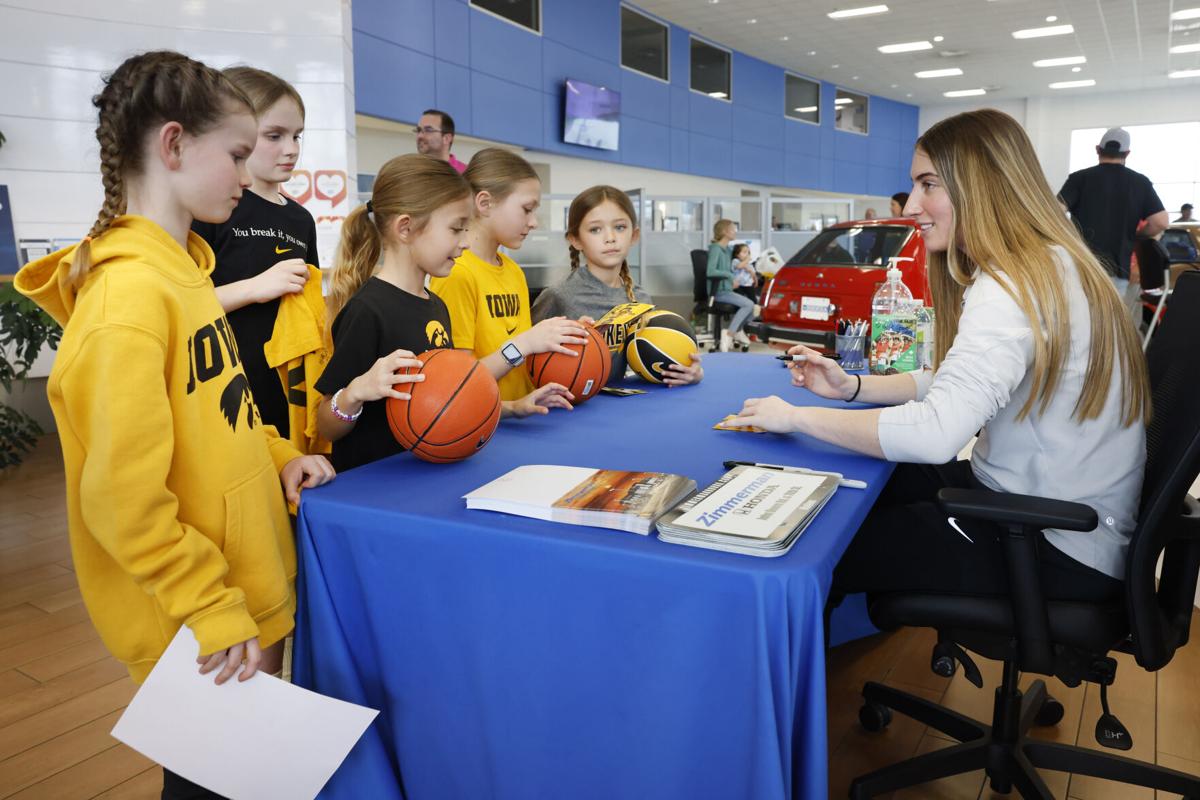 Hawkeye's Kate Martin signs autographs in Moline