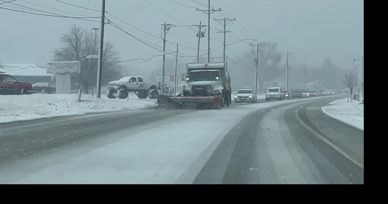 Rain and snow fill Quad-Cities streets with slush Thursday