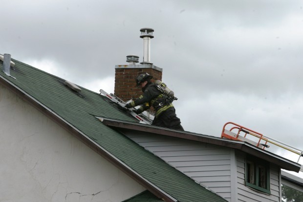 Woman injured in Moline house fire