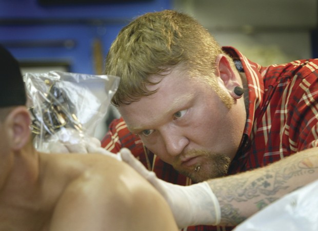 New fees hit Q-C body art shops