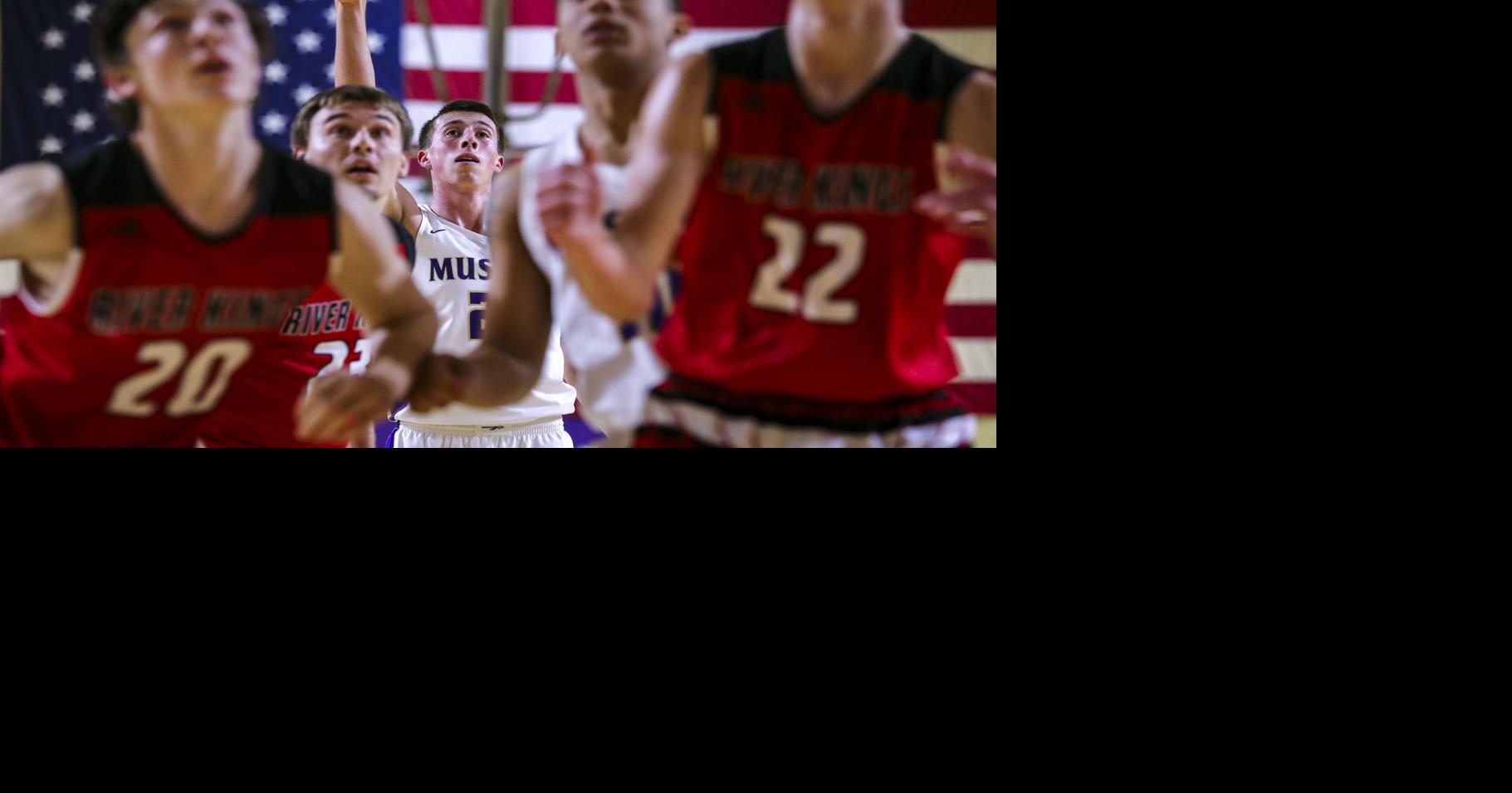 Photos: Clinton basketball at Muscatine