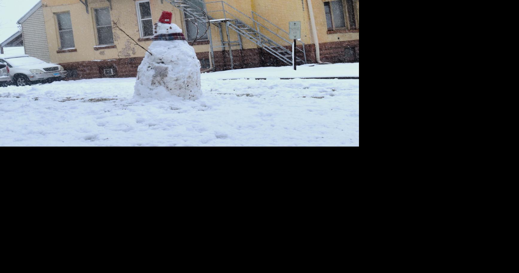 Snowman emerges in Davenport during Tuesday's winter storm