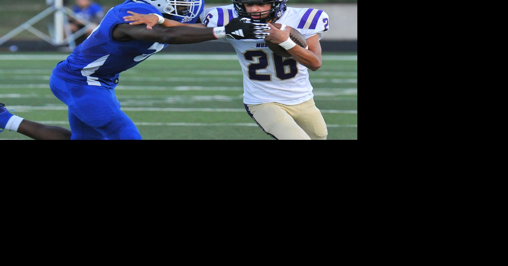 Photos: Muscatine at Davenport Central football