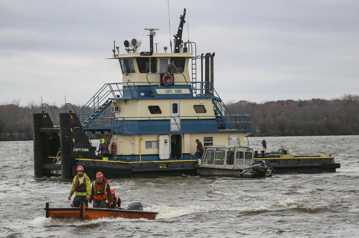 Photos: Four in capsized boat rescued by tow