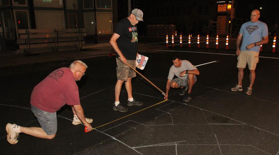 Painting the Quad-City Times Bix 7 logo