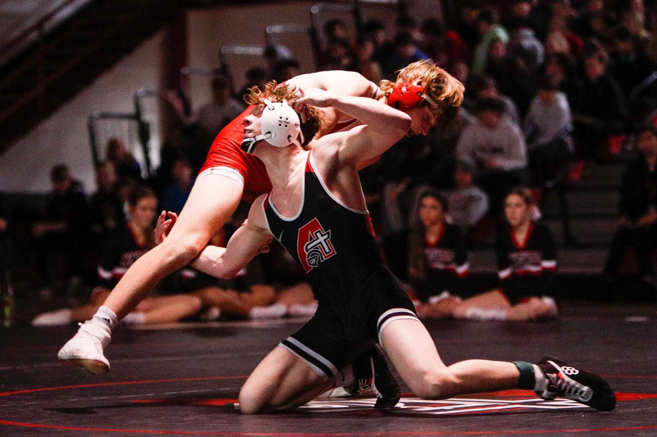 Photos: Assumption wrestling defeats North Scott, 36-31