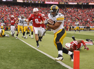 Notes: Coker climbs Iowa rushing chart