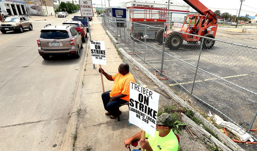 Noon update: Rain, short shorts and bike lanes