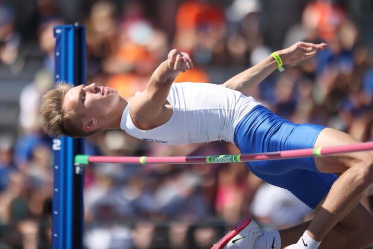 DeWitt's Rheingans repeats as 400 hurdles champion