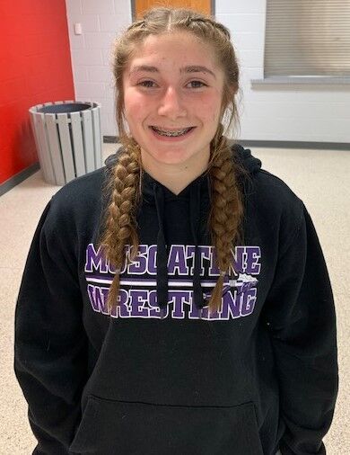 Prep girls wrestling: Muscatine's Lewis overcomes technical error to go ...