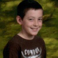 Boy pinned under ATV dies