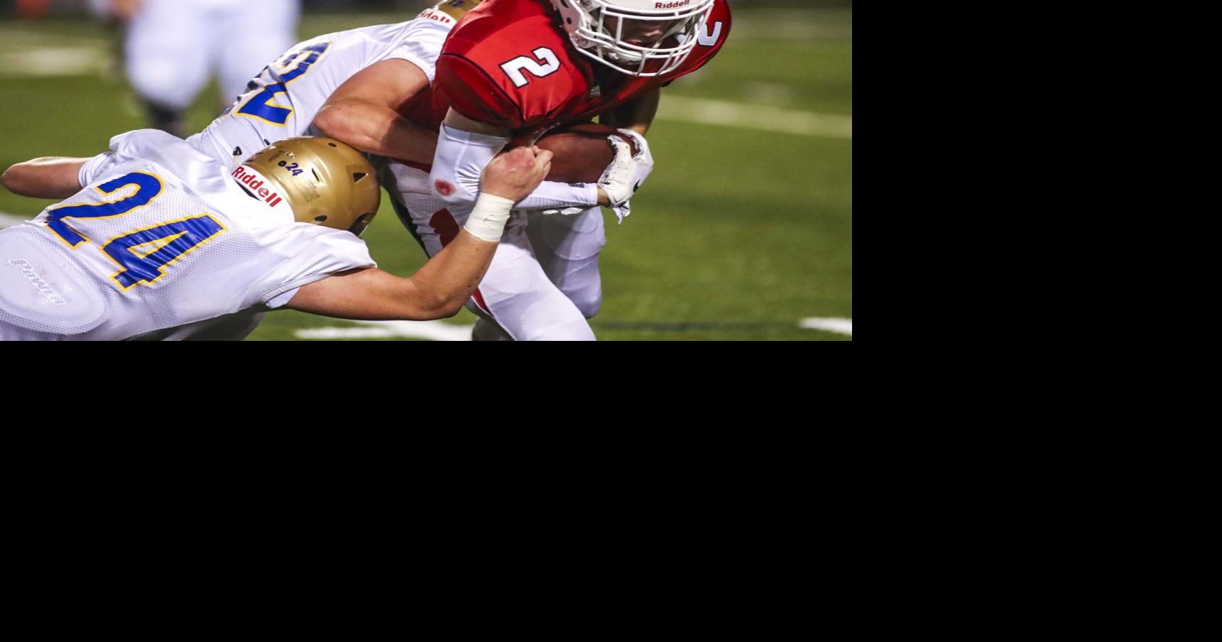 Photos: Assumption football defeats Wahlert at Brady Street Stadium