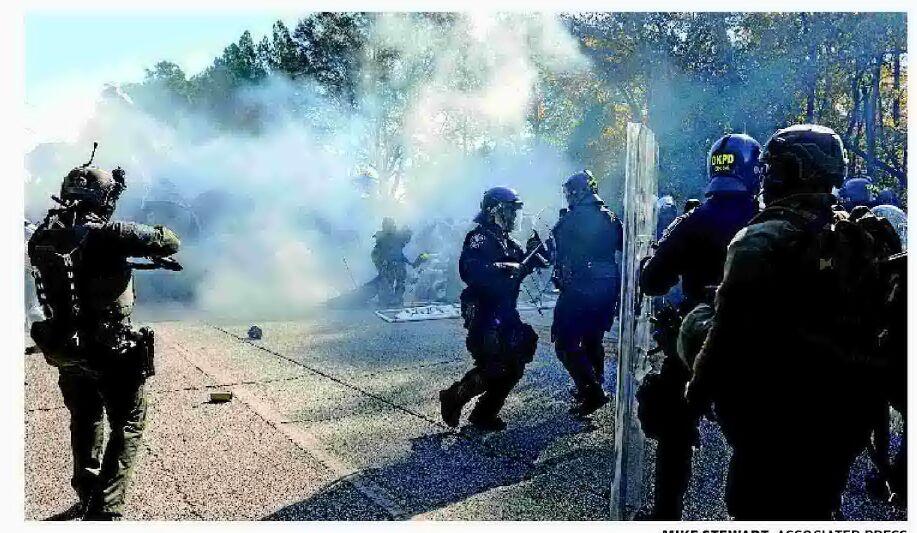 POLICE USE TEAR GAS ON PROTESTERS OF 'COP CITY' FACILITY