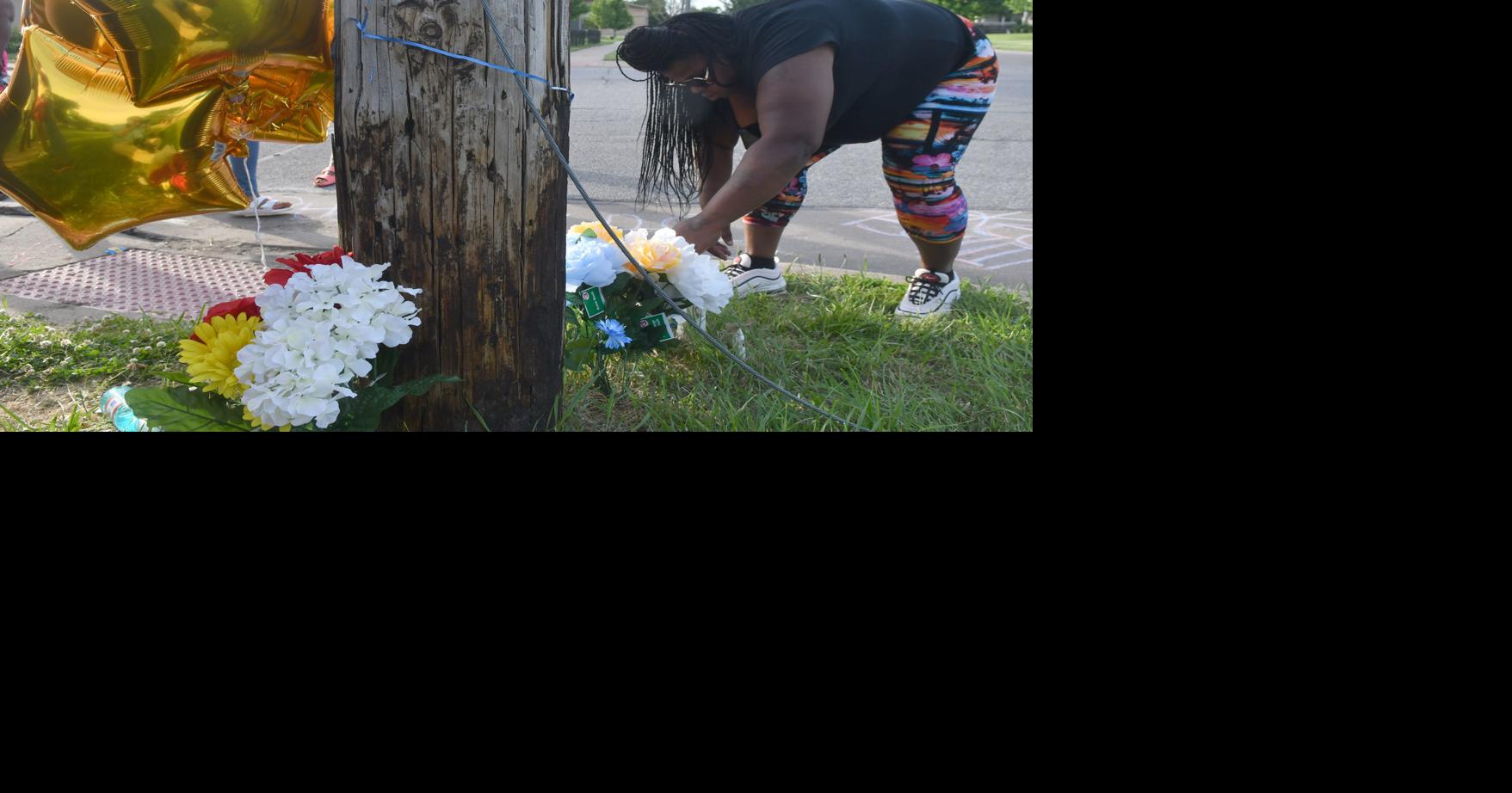 Photos: Candlelight vigil for shooting victim Kameron R. Moore