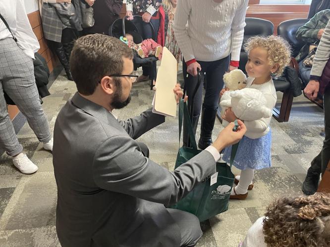 'This is our celebration:' Adoptions finalized for 13 children in Scott ...
