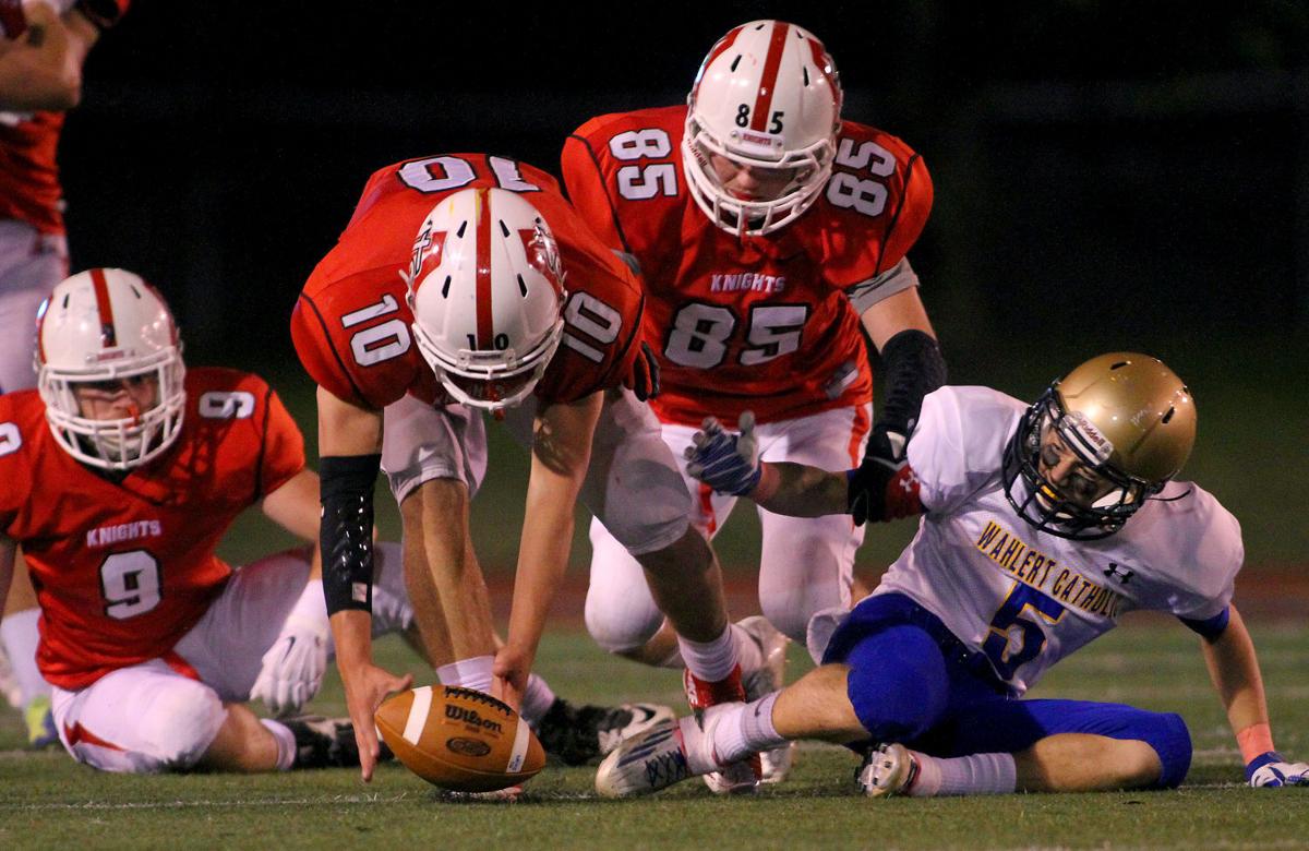 Photos: Assumption Hosts Dubuque Wahlert in Football