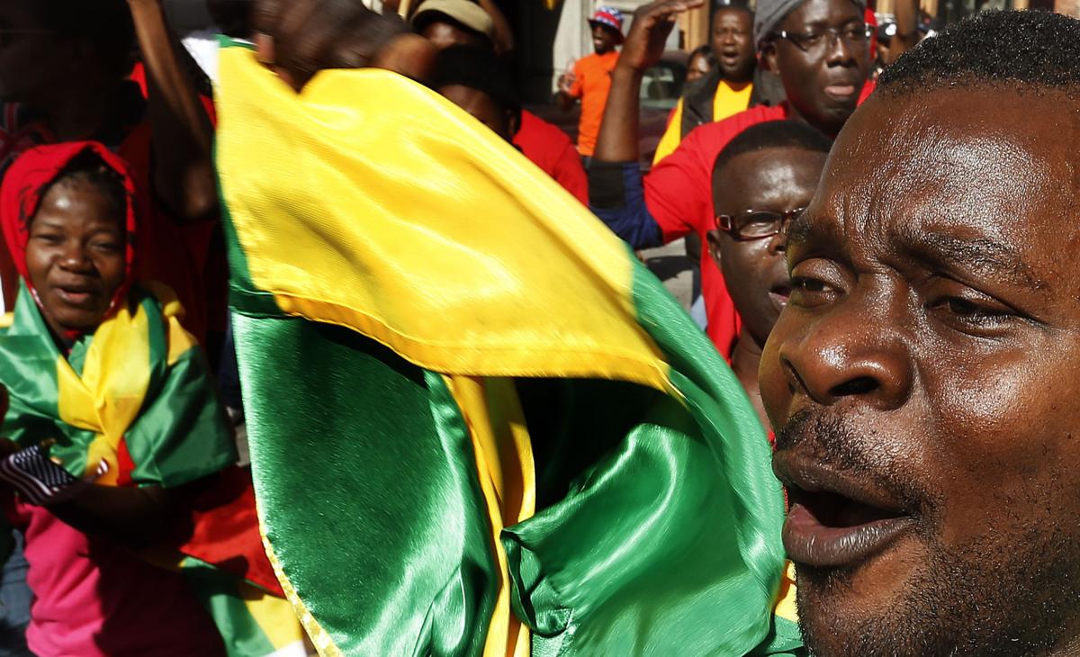 Photos: Rally For Togo | News - Local and National | qctimes.com