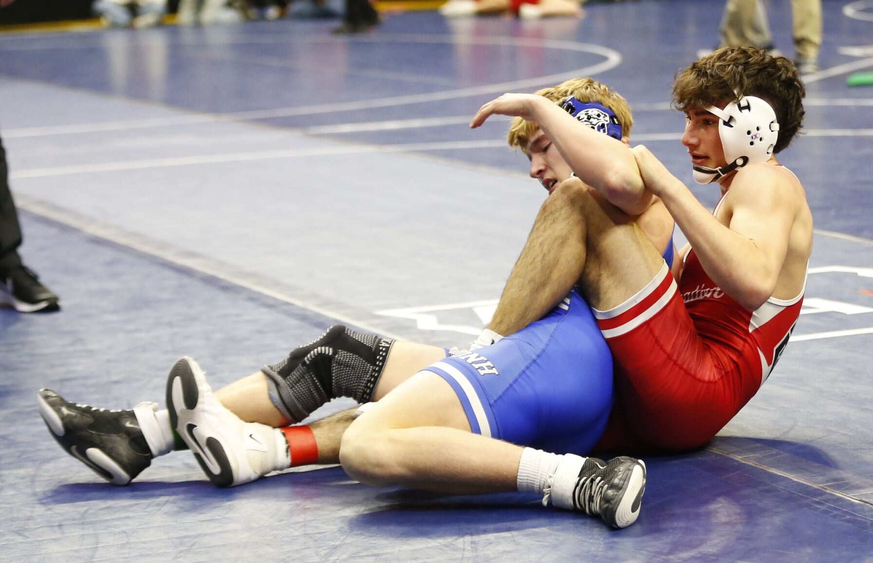 Photos: Quad-Cities wrestlers at the Iowa state wrestling tournament