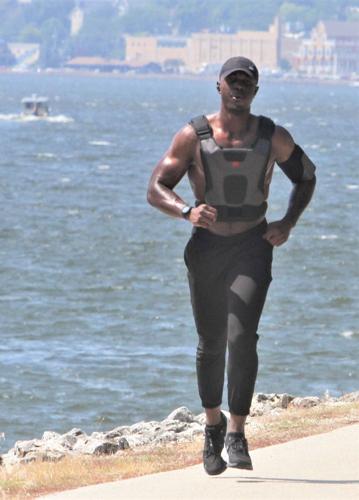 Despite the heat, Trey Blount of Davenport takes his run along the ...