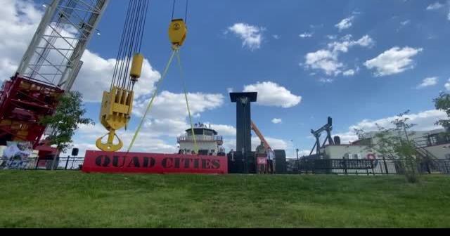 A christening ceremony for the new “Quad Cities” heavy-lift crane barge