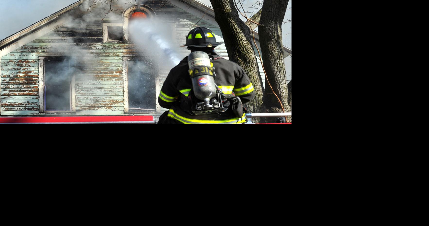 Updated: Two-house fire ruled accidental, smoking materials blamed