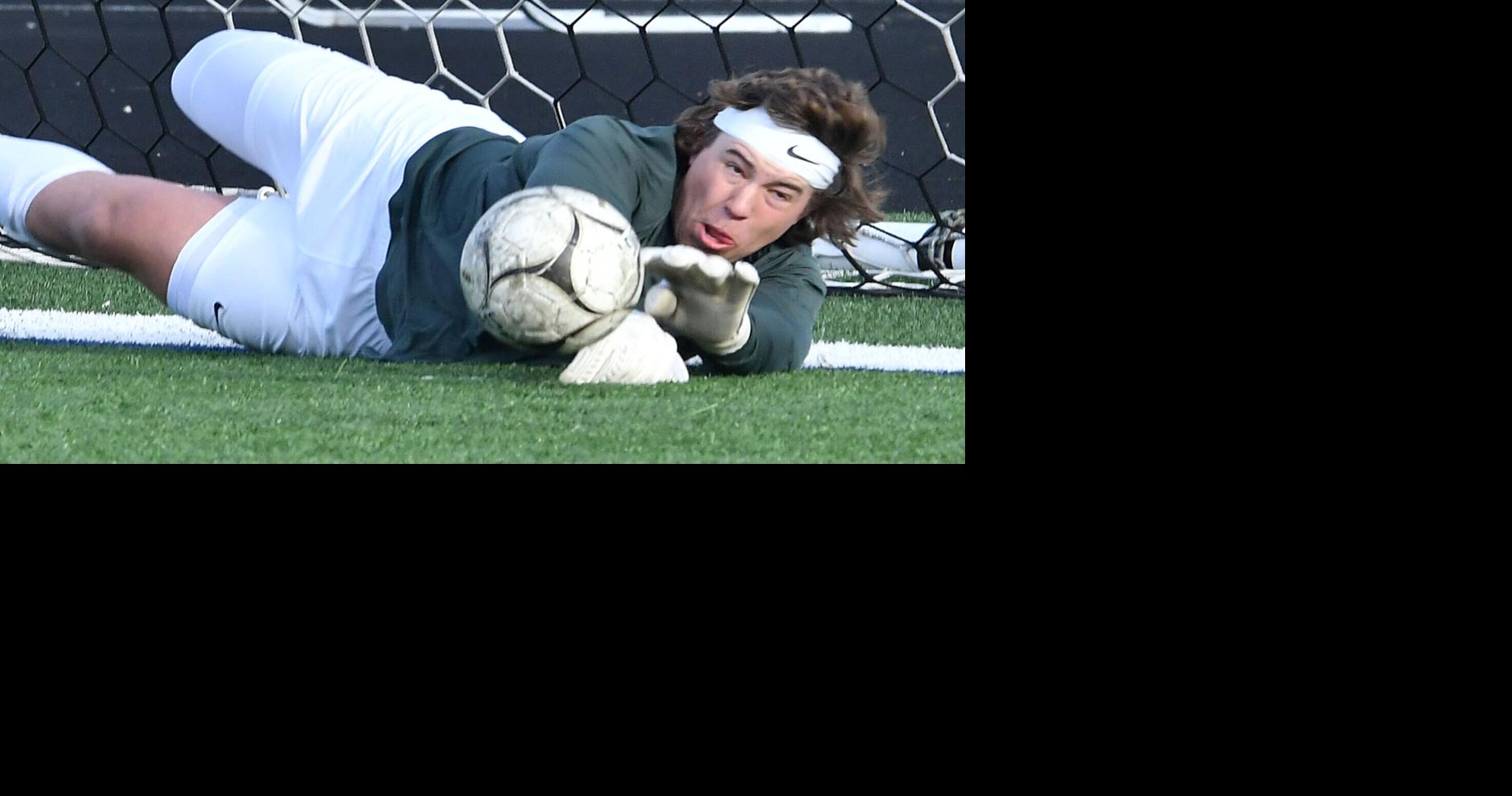 Prep boys soccer: Edwards, Sabers upend Blue Devils in OT