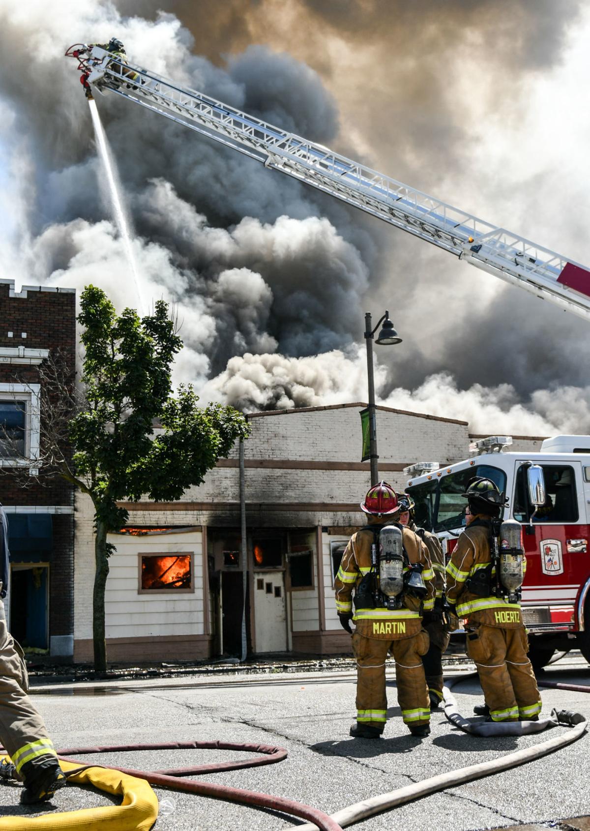 Stubborn fire takes down two East Moline downtown businesses; no one ...