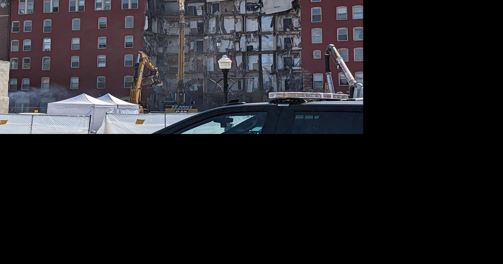 Crews tearing down parts of collapsed building Saturday 'to control ...