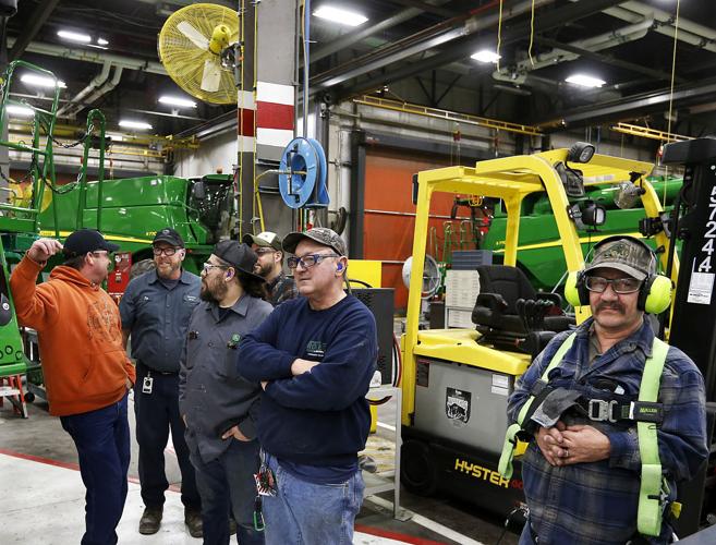 Staying green: Minnesota farmer has purchased 500 combines from Deere ...