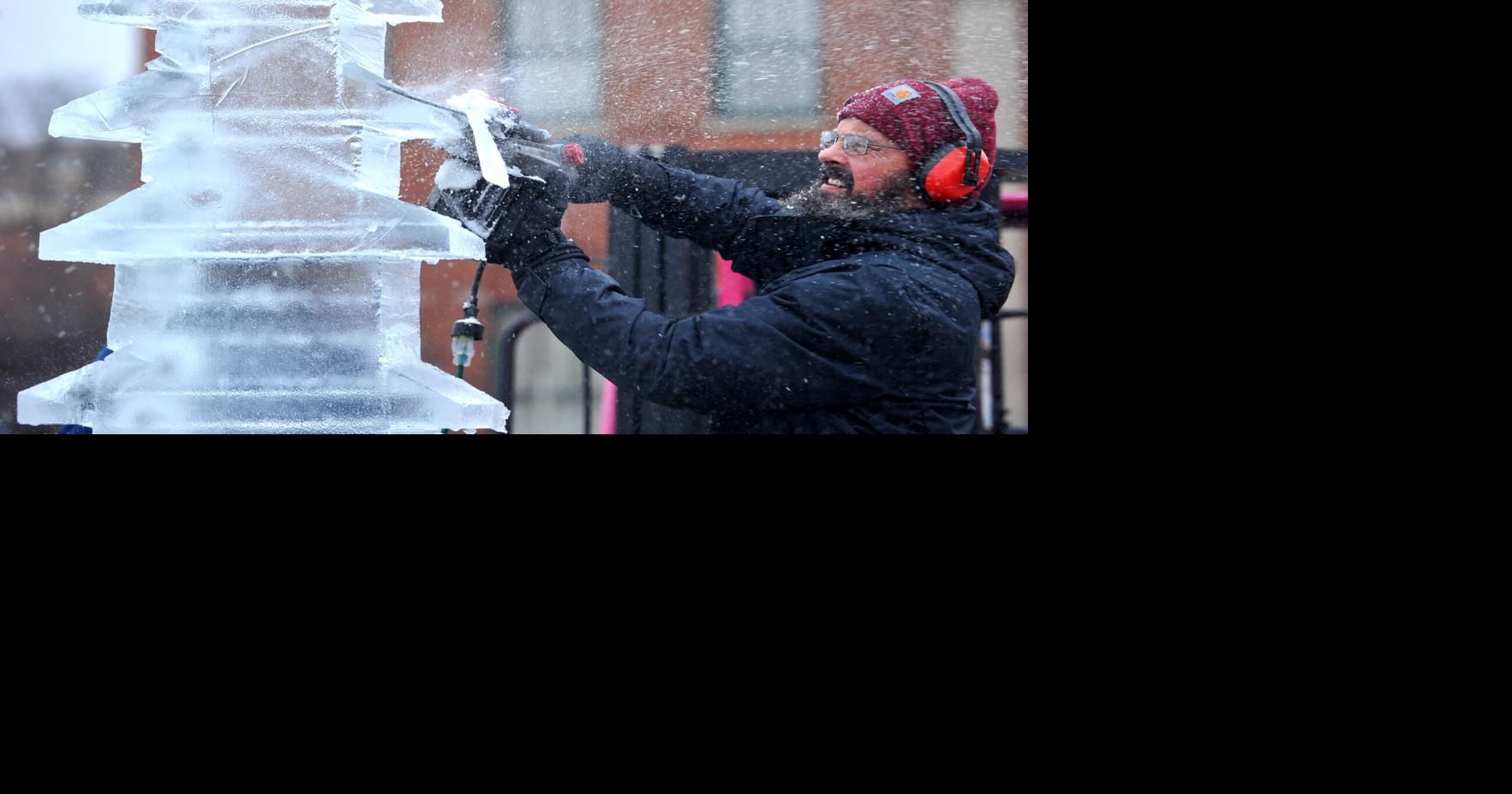 Photos: Ice sculptors work on their ice carvings for Icestravaganza