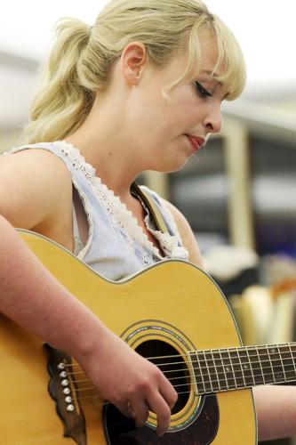 Elizabeth Moen wrote her first song 3 years ago. Now, she's one of Iowa ...